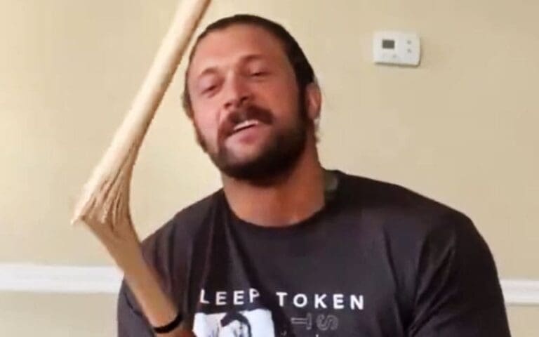 Karrion Kross Demonstrates Ankle Lock Technique to Snap Baseball Bat