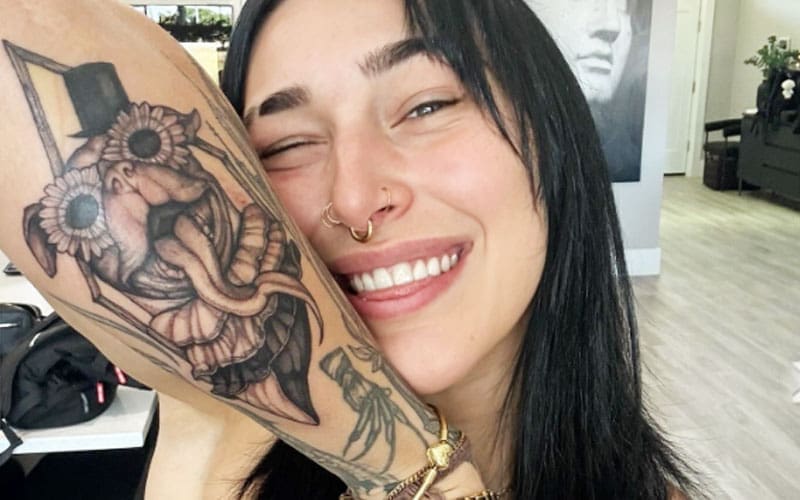 Rhea Ripley Dedicates New Tattoo to Her Beloved Dog